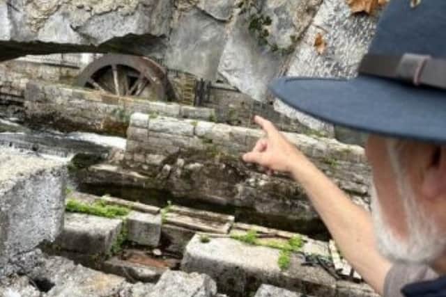 'Extraordinary' long-hidden mill wheel features and stonework uncovered ...