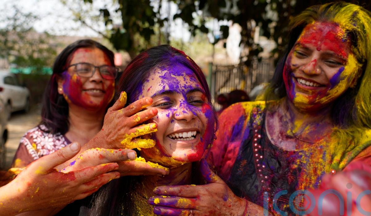 Indians mark the reawakening of spring at Holi, the Hindu festival of ...
