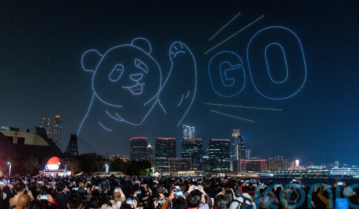 Crowds gather to watch spectacular drone show marking arrival of giant ...