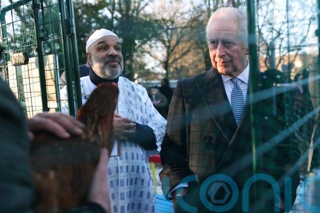 King and Queen Consort visit community kitchen at centre of new farm ...