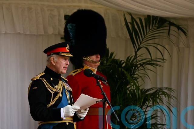 King pays tribute to Irish Guards ahead of Trooping the Colour ...