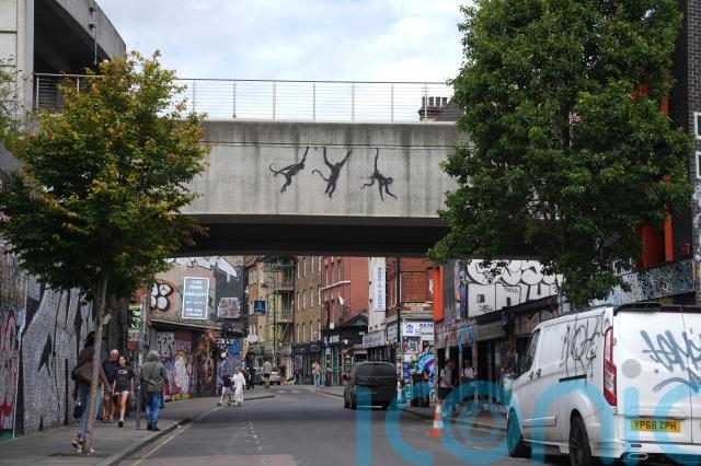 Banksy unveils howling wolf as next piece in animal-themed street art ...