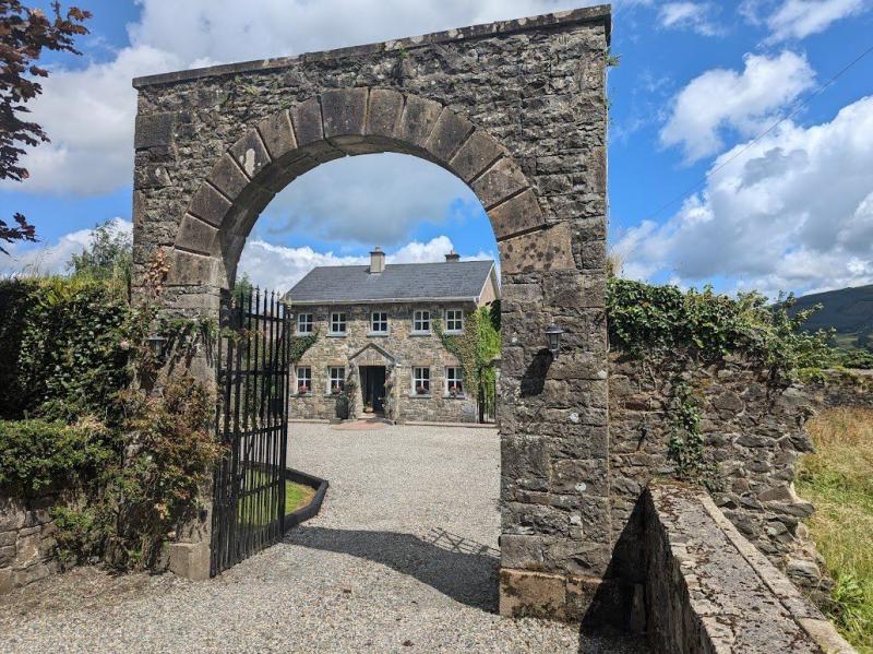 Glenaguile House, with its original arch and 'secret garden' goes on ...